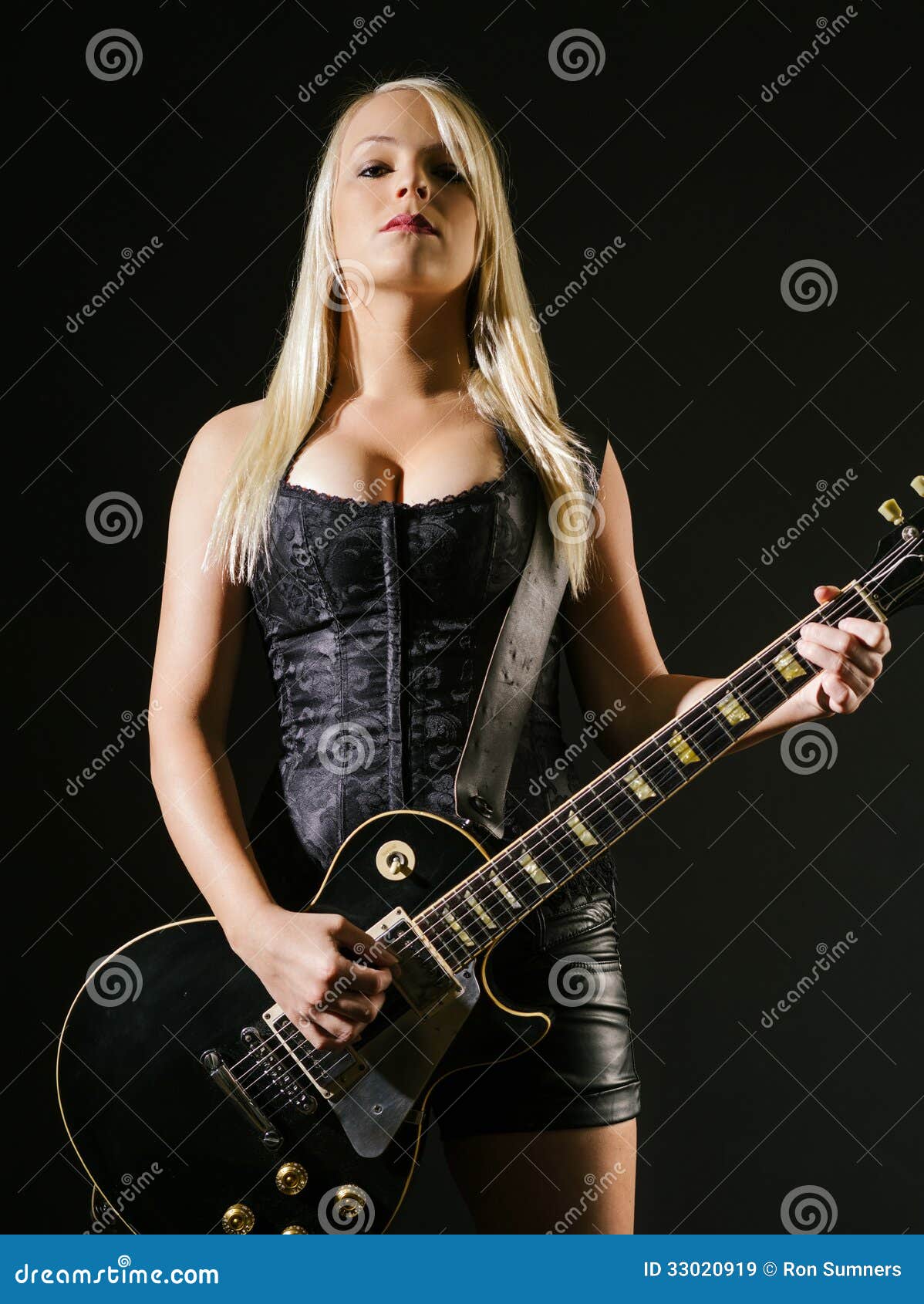 Serious Blond Female Playing Electric Guitar Stock Image Image Of