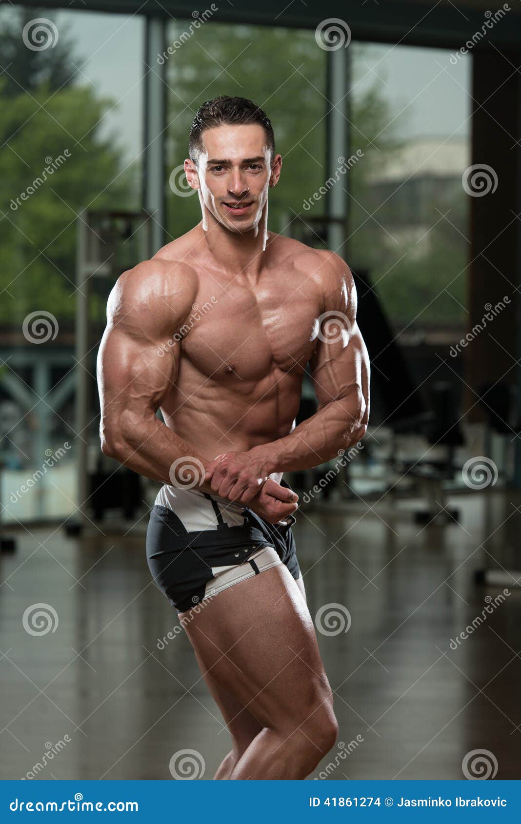 Serious BodyBuilder Standing in the Gym Stock Photo - Image of handsome ...