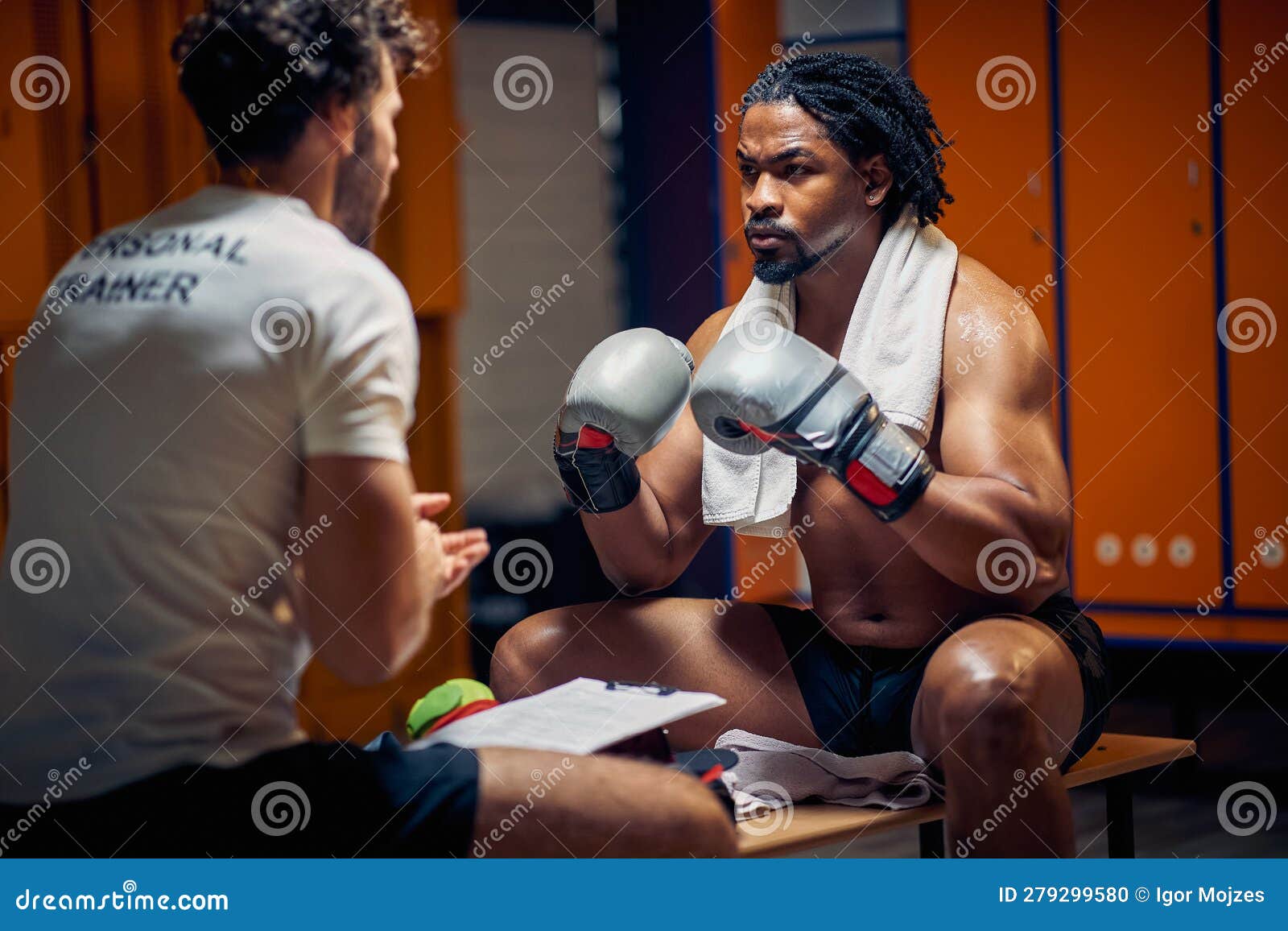 Serious Boxing Player Sitting on Bench Face To Face with Coach Getting ...