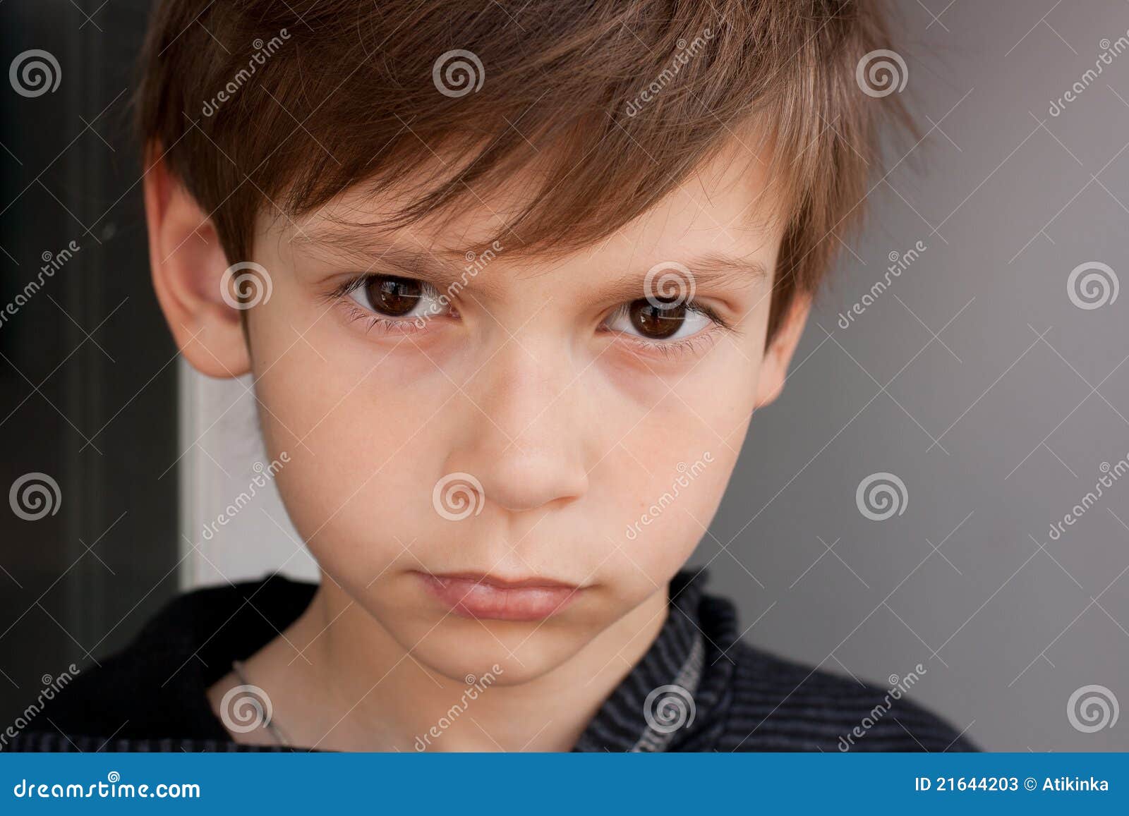 Serious boy stock image. Image of childhood, white, angry - 21644203