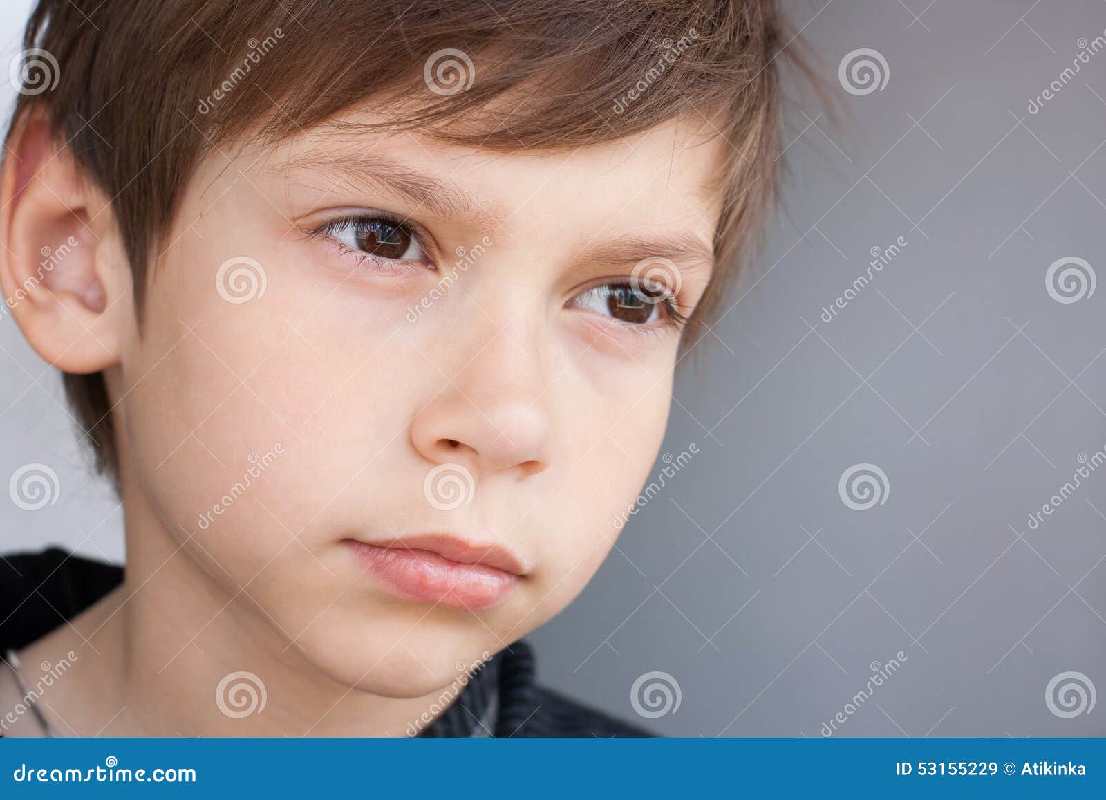 Serious boy stock image. Image of emotion, sadness, mood - 53155229