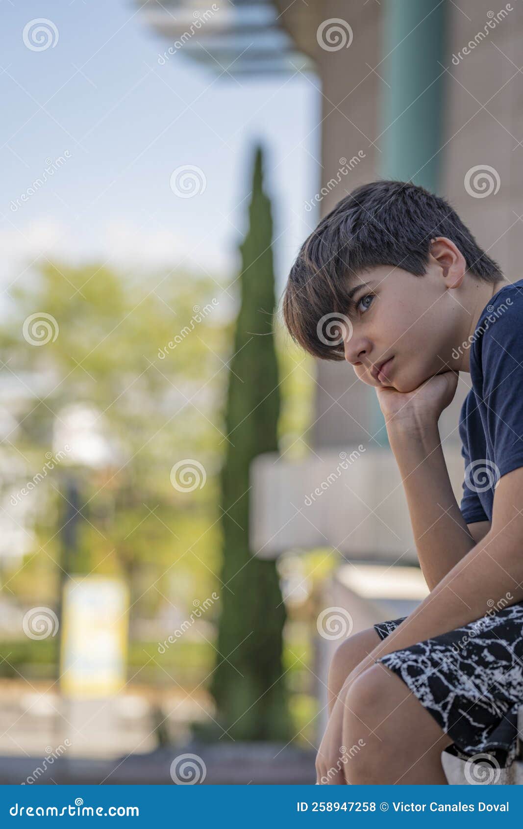 Serious Boy Thinking Over a Problem and Contemplating Sitting on a ...