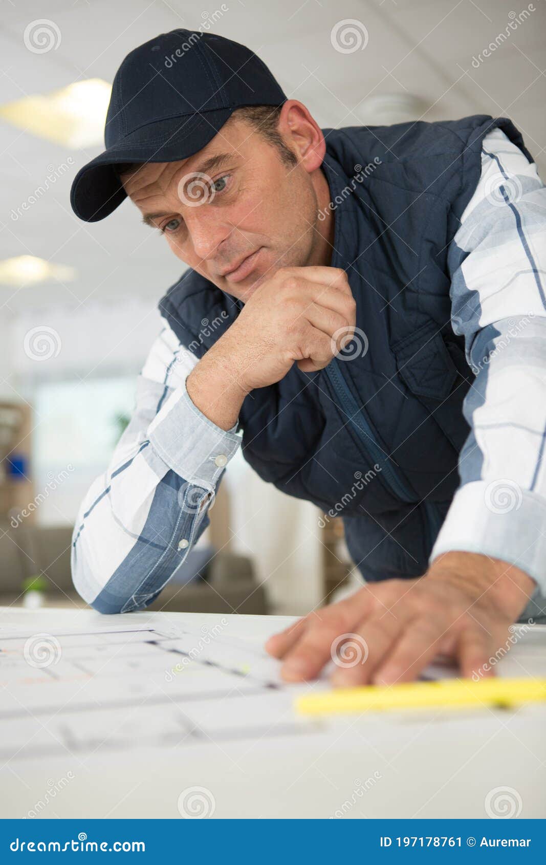 Serious Builder Looking at Plan Stock Image - Image of looking ...