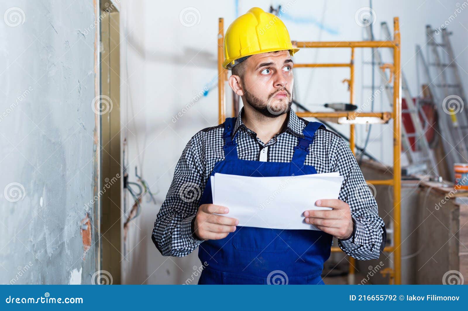 Builder is Looking on the Project of Work Stock Photo - Image of ...