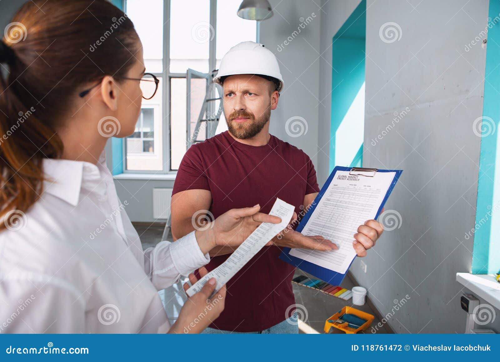 Serious Builder Showing the Contract To His Client Stock Photo - Image ...