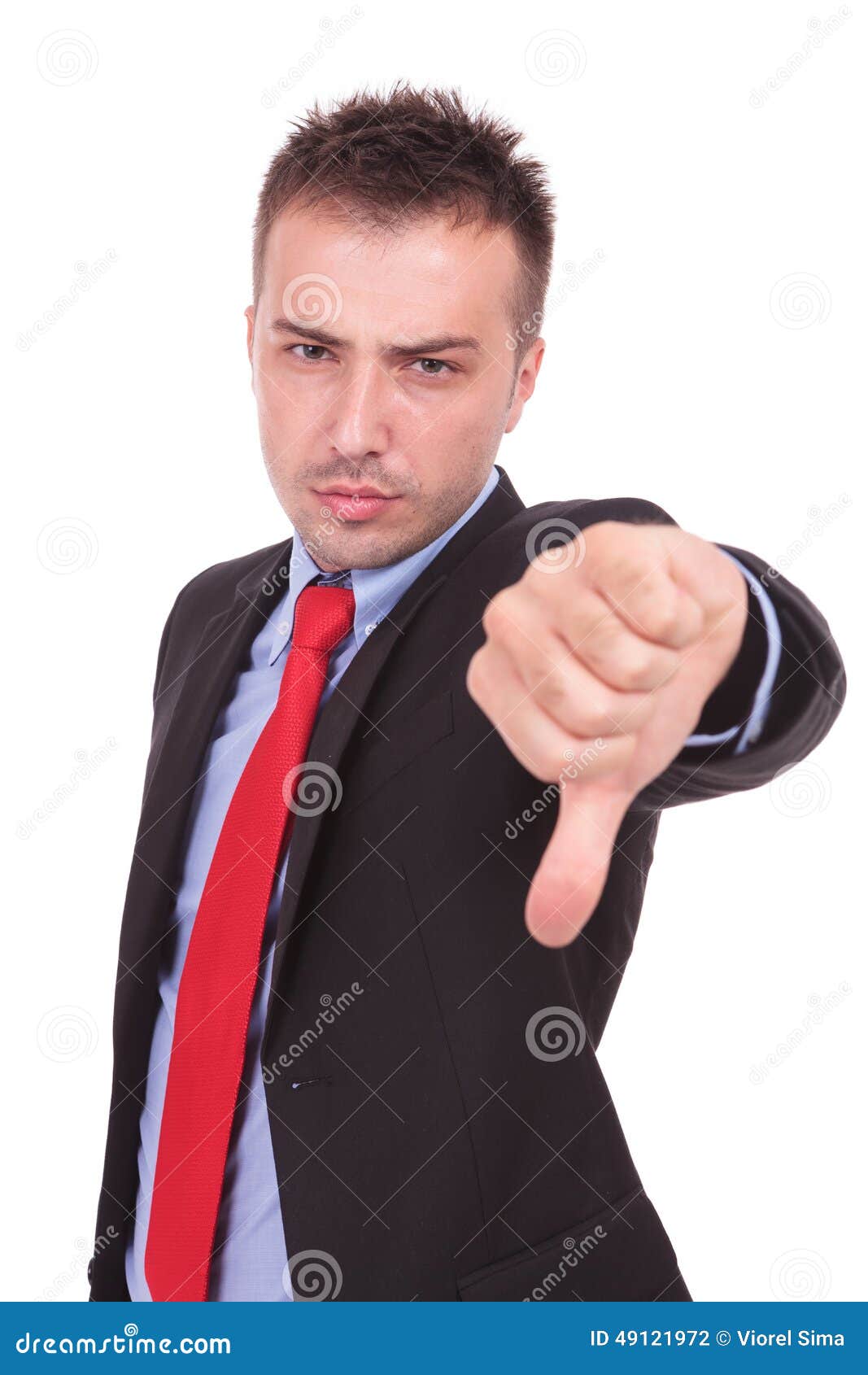 Serious Business Man Showing the Thumb Down Gesture. Stock Photo ...