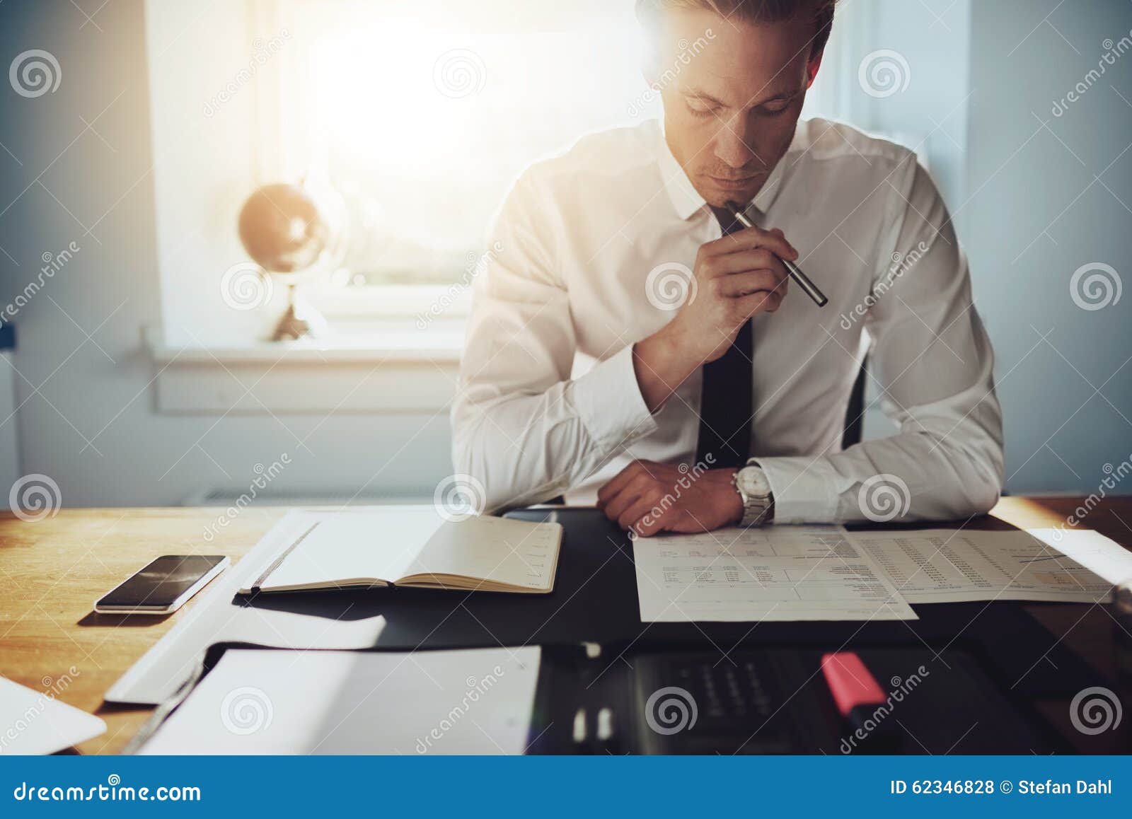 Serious Business Man Working on Documents Stock Photo - Image of career ...