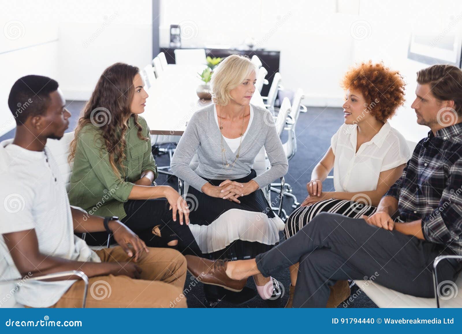 Serious Business People Discussing in Office Stock Photo - Image of ... Serious Business People Discussing in Office Stock Photo - Image of ...
