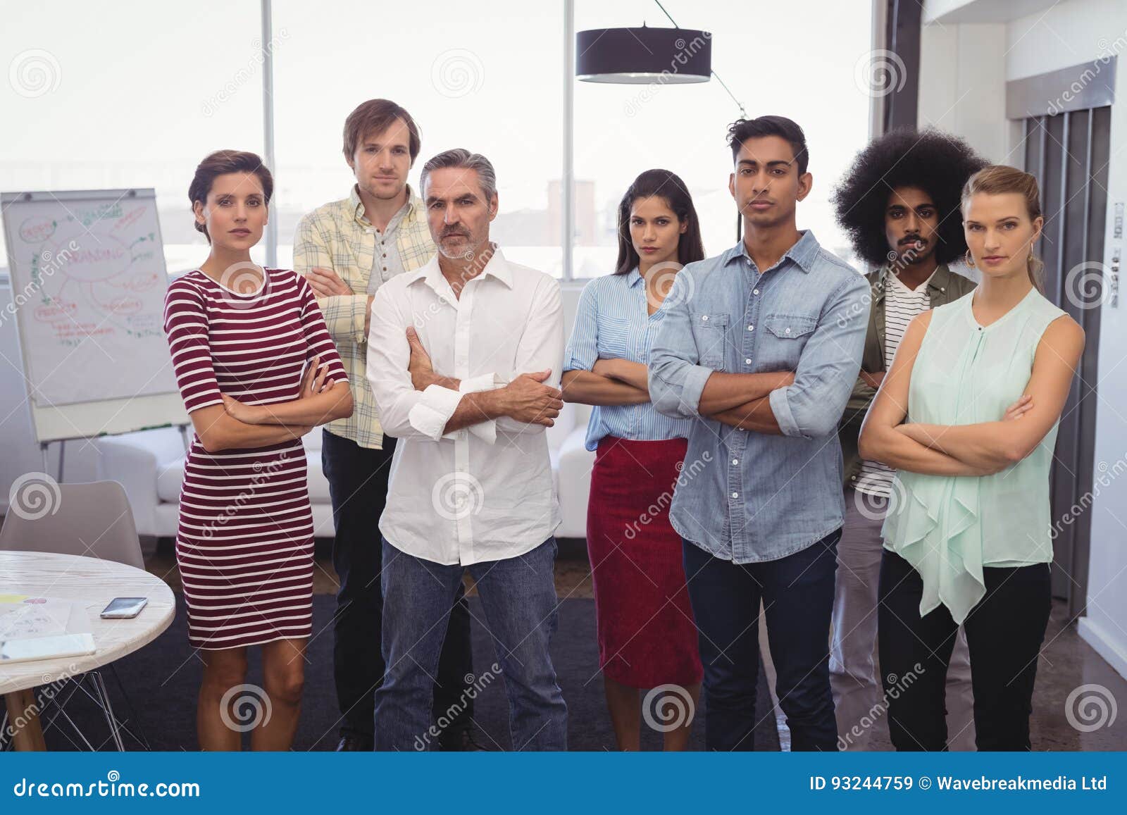 Serious Business People Standing in Creative Office Stock Image - Image ...