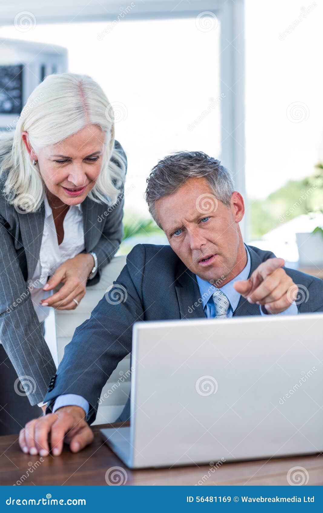 Serious Business People Working on Laptop Computer Stock Image - Image ...
