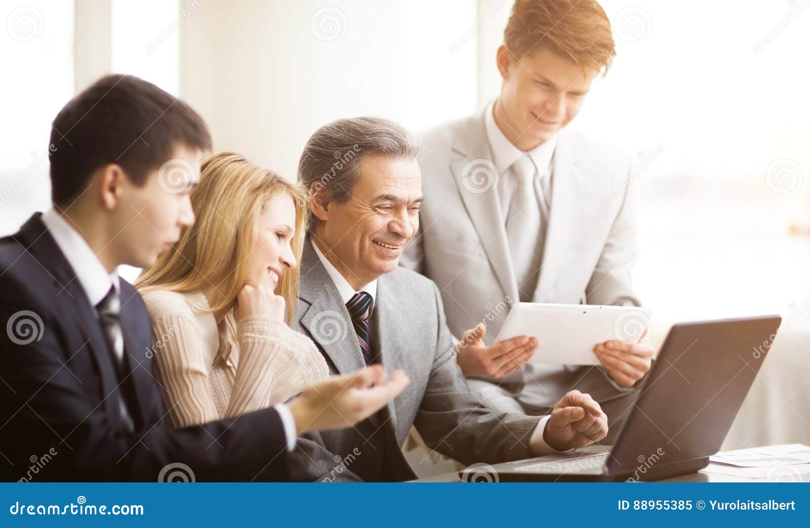 Serious Business Team with Tablet Computers, Documents Having ...