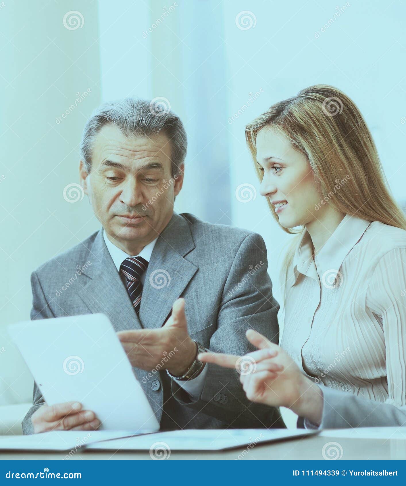 Serious Business Team with Tablet Pc Computers, Documents Having ...
