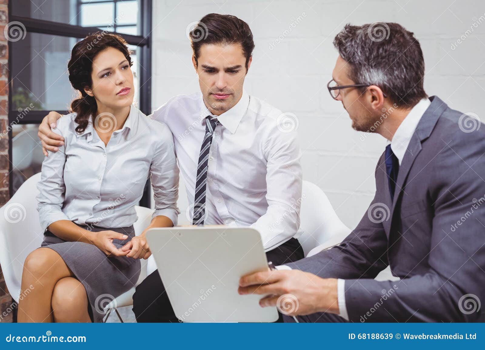 Serious Businessman Discussing with Client Stock Image - Image of ...