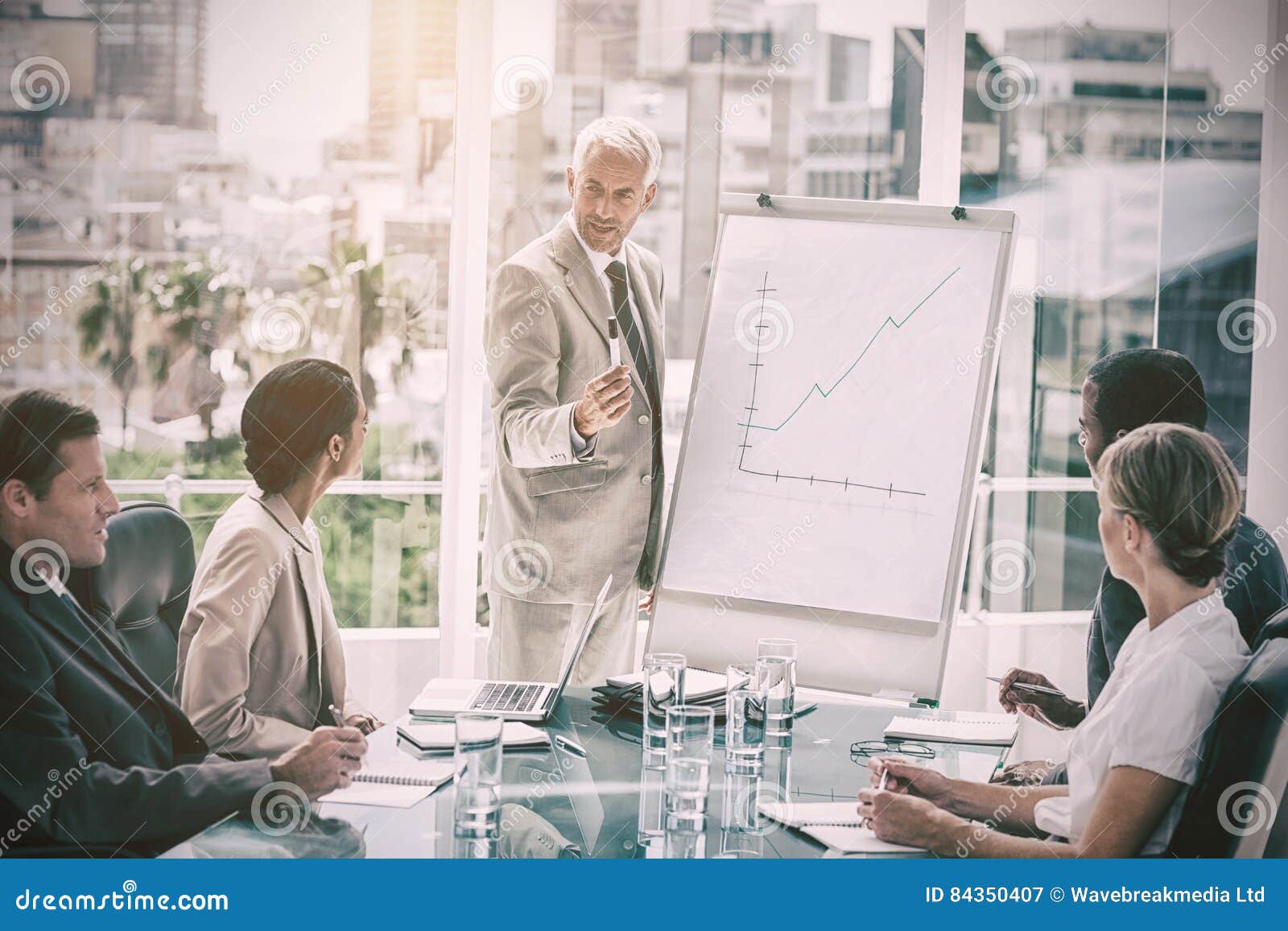 Serious Businessman Giving a Presentation Stock Image - Image of jacket ...