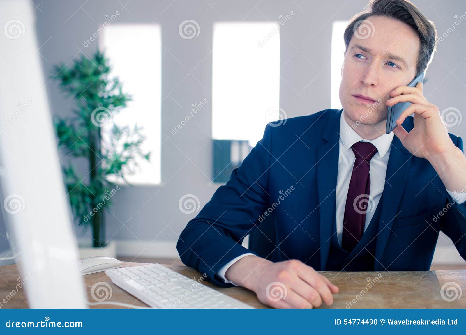 Serious Businessman Having a Phone Call Stock Photo - Image of call ...