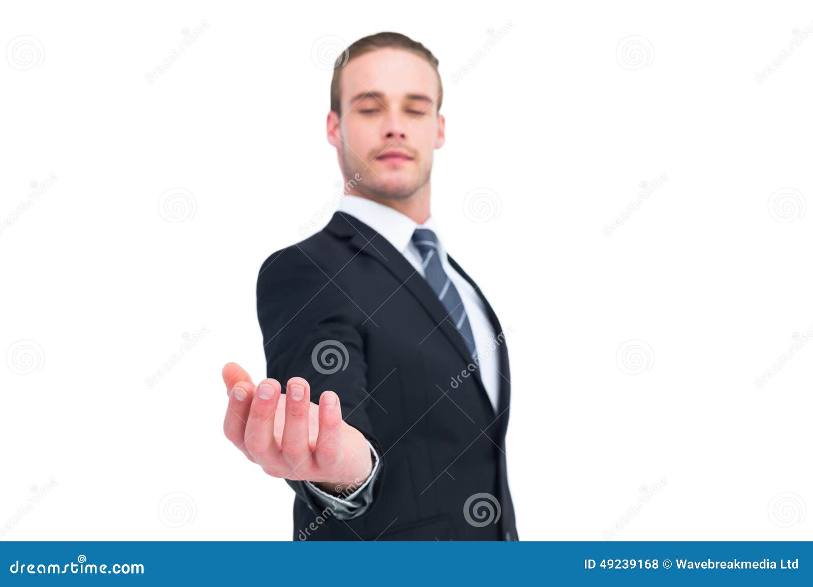 Serious Businessman Holding Out His Hand Stock Photo - Image of dressed ... Serious Businessman Holding Out His Hand Stock Photo - Image of dressed ...