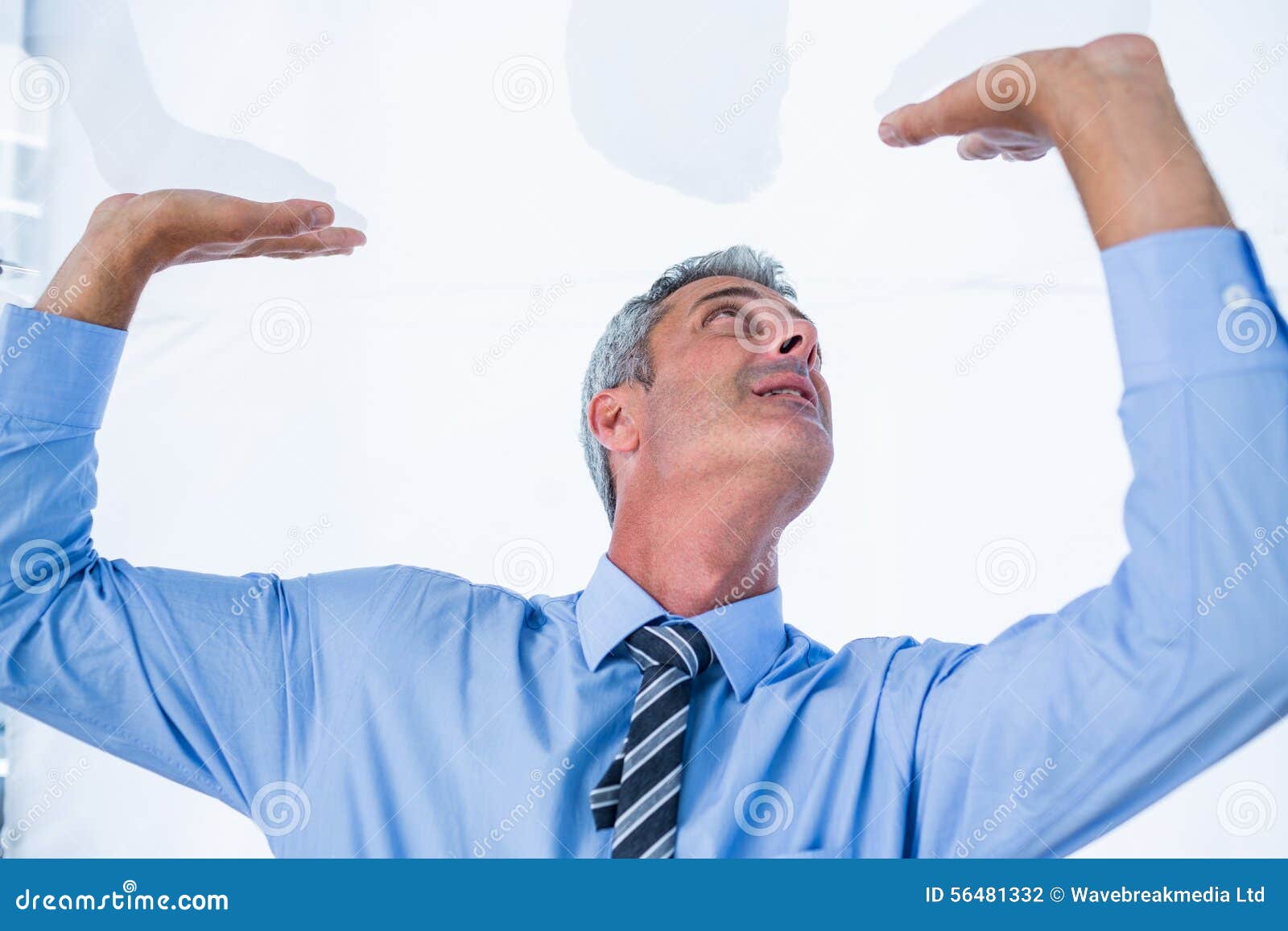 A Serious Businessman Lifting Something Stock Photo - Image of male ...