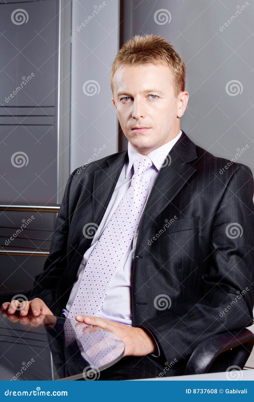 Serious Businessman in Office Stock Photo - Image of hands, chair: 8737608