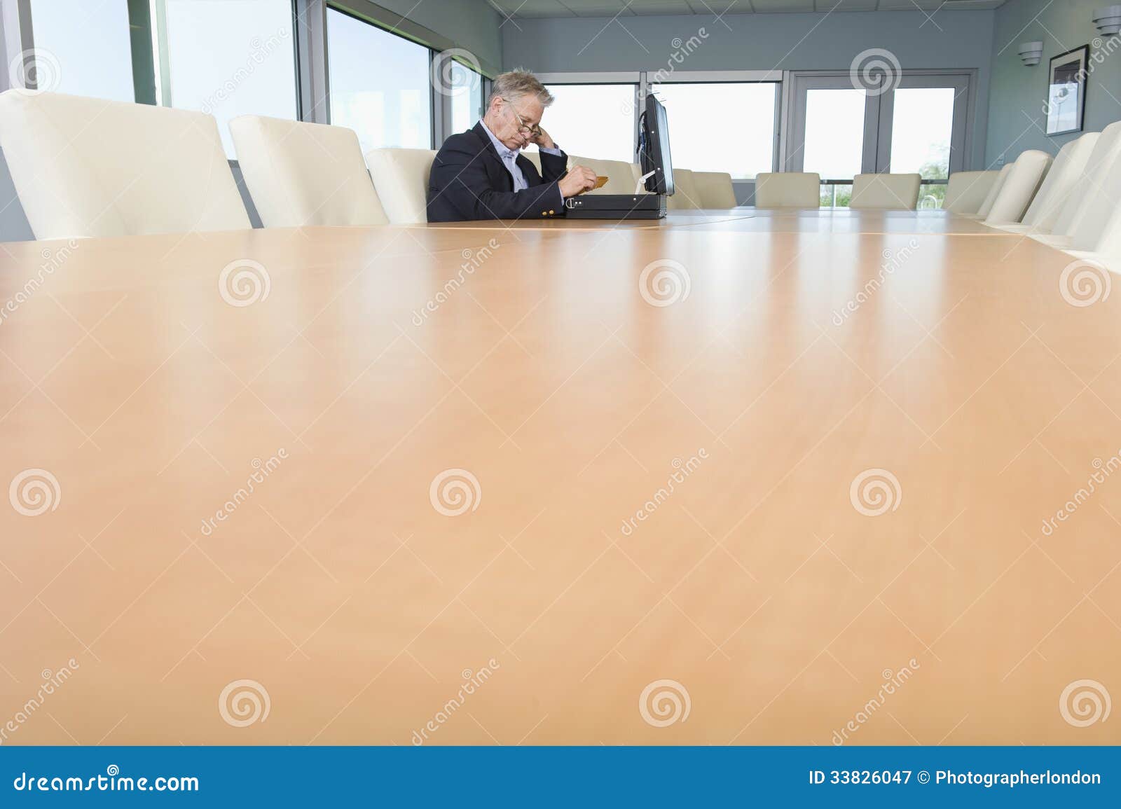 Serious Businessman with Open Briefcase Stock Image - Image of pensive ...