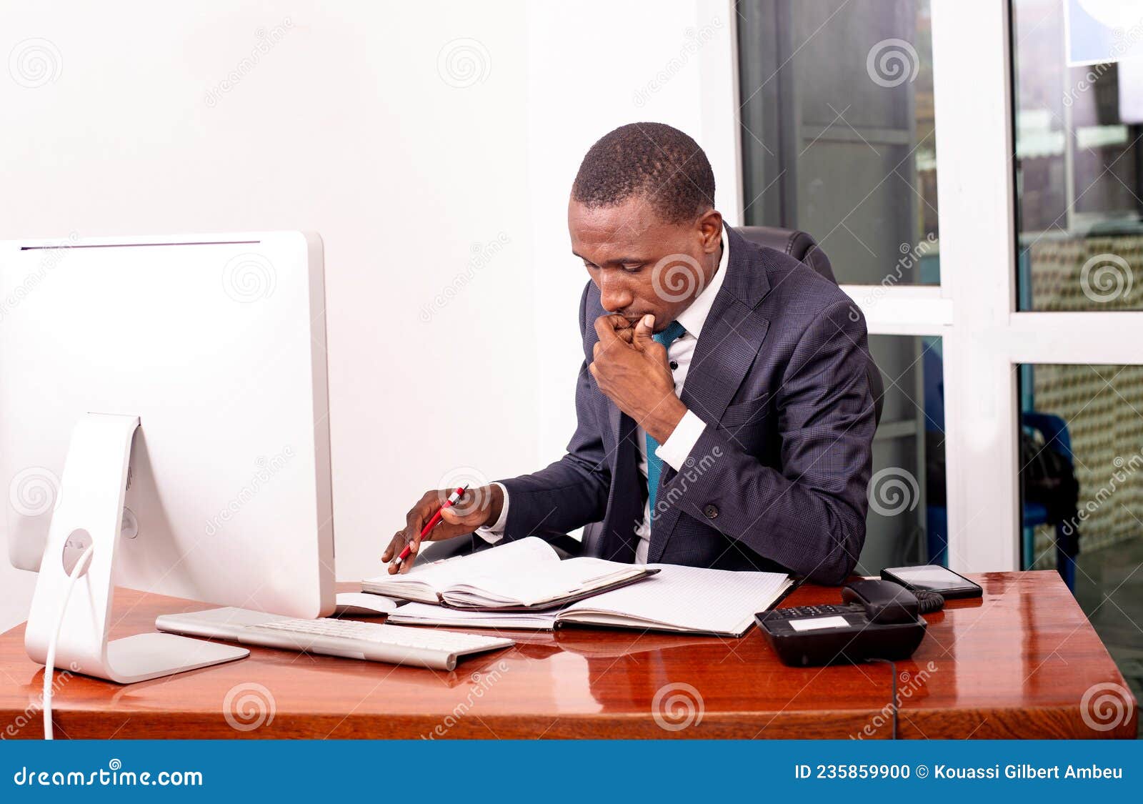 Young Serious Businessman Working in the Office Stock Photo - Image of ...