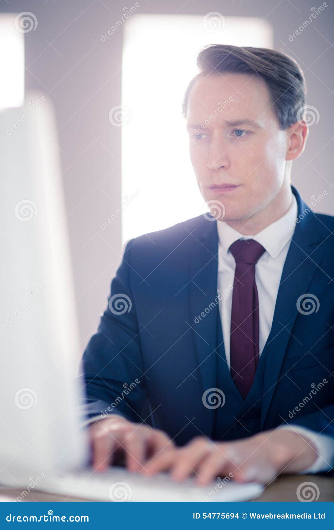 Serious Businessman Typing on Computer Stock Photo - Image of adult ...