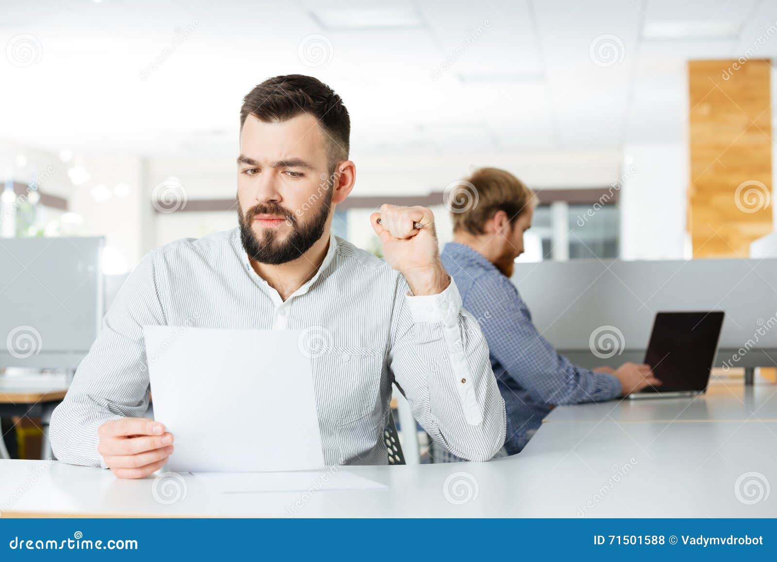 Serious Businessman Working with Documents in Office Stock Photo ...