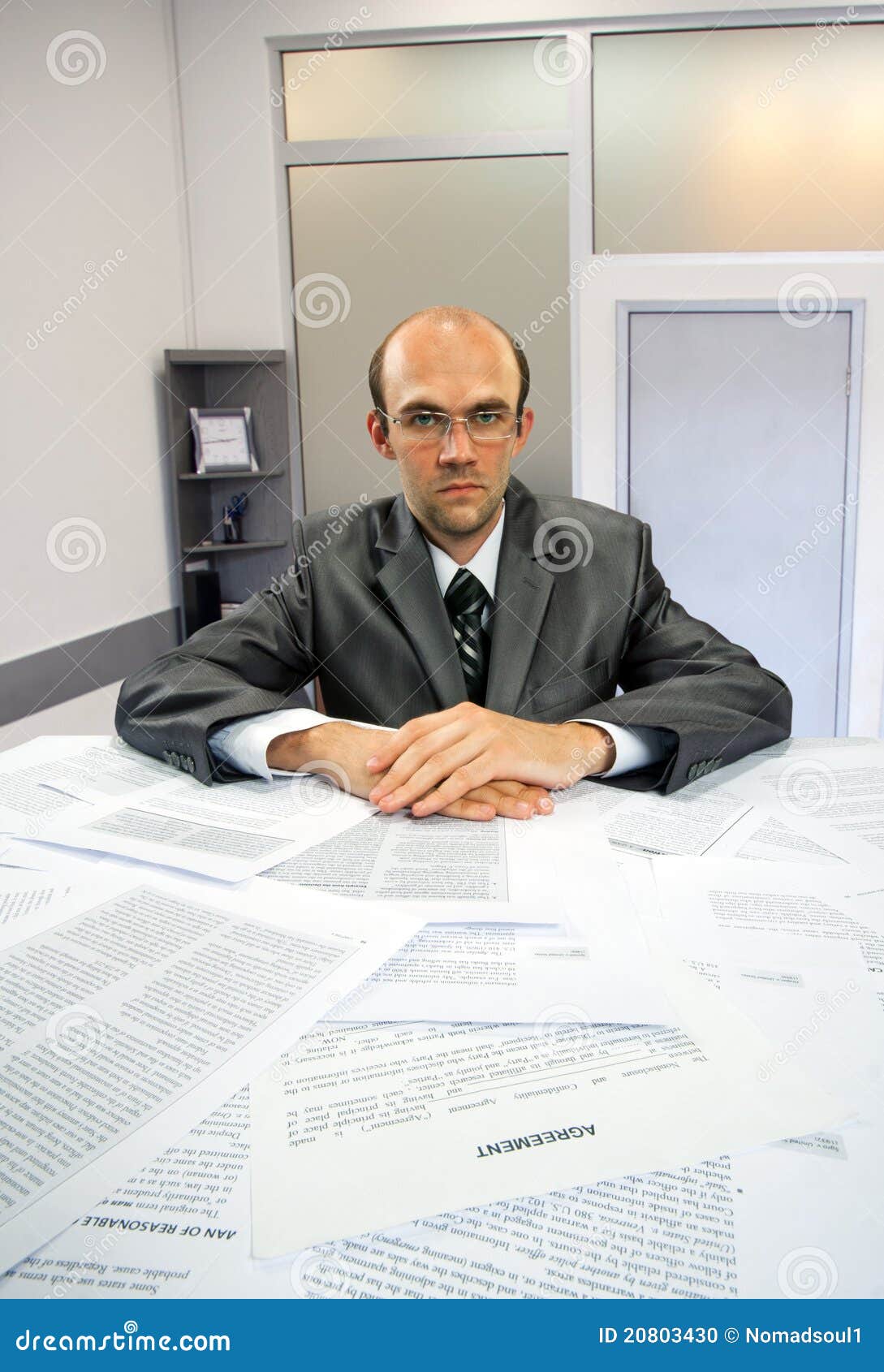 Serious Businessman Working in Office Stock Photo - Image of document ...