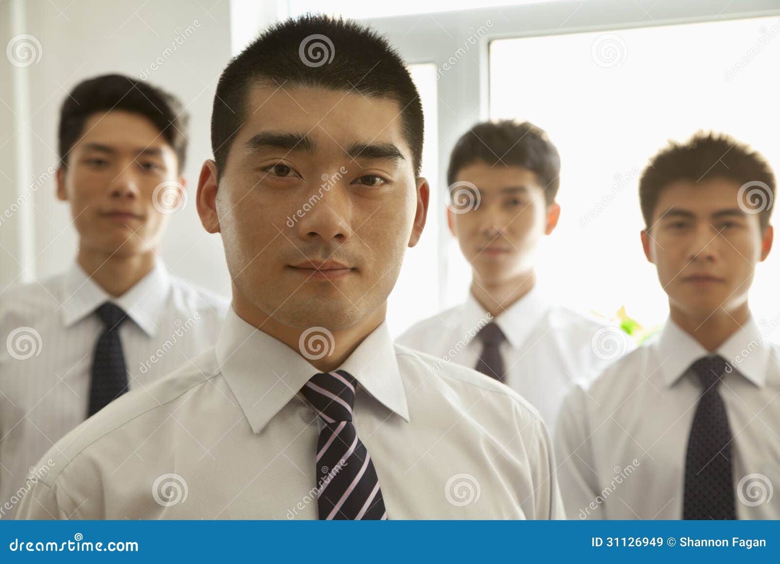Serious Businessmen in the Office Looking at Camera, Portrait Stock ...