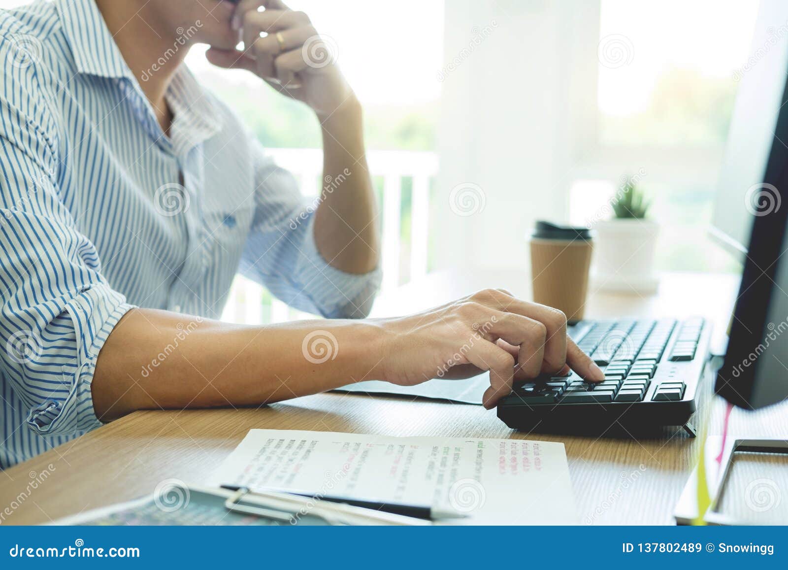 Serious Busy Hipster Young Web Software Developer Programmer is Coding or Programming on a ...