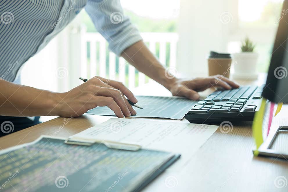 Serious Busy Hipster Young Web Software Developer Programmer is Coding or Programming on a ...