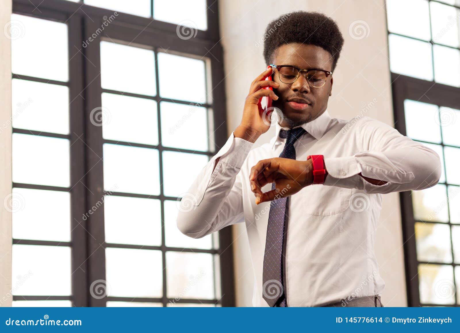 Serious Busy Man Looking at the Time Stock Photo - Image of ...