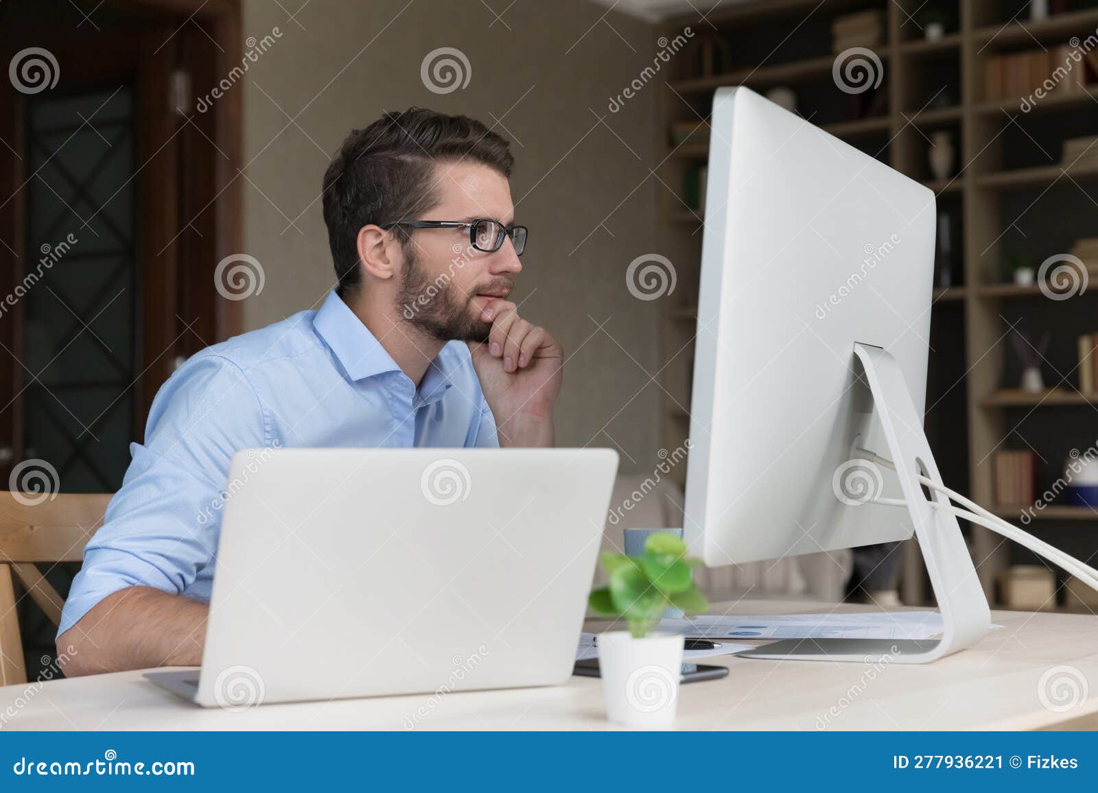 Serious Busy Young Freelancer Man Working on Online Project Stock Image ...