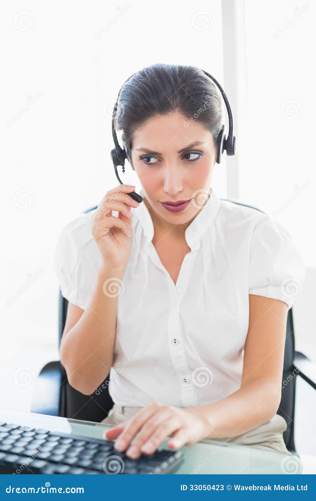 Serious Call Centre Agent Working at Her Desk on a Call Stock Image ...