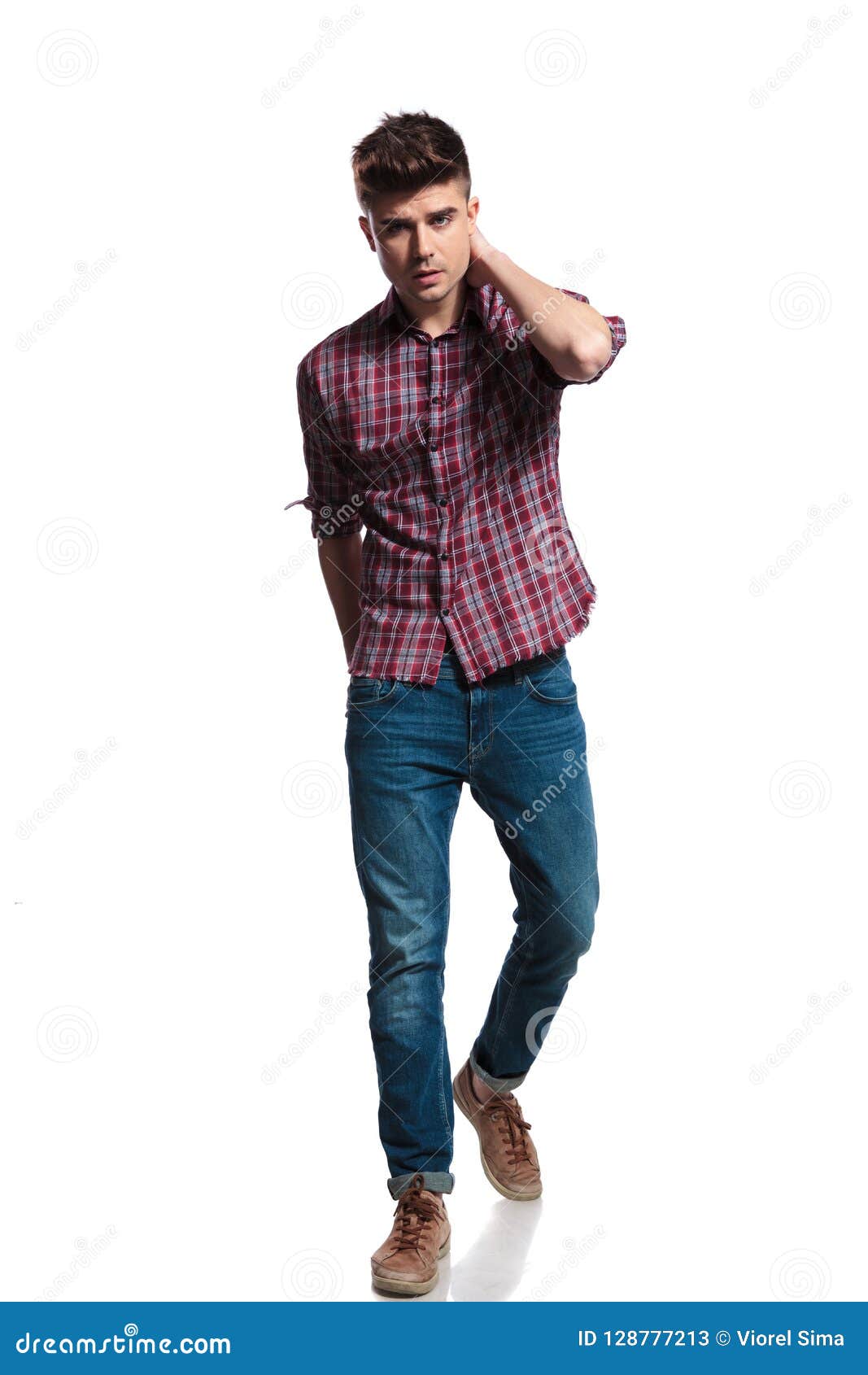 Serious Casual Man Holding Neck and Posing Steps Forward Stock Image ... Serious Casual Man Holding Neck and Posing Steps Forward Stock Image ...