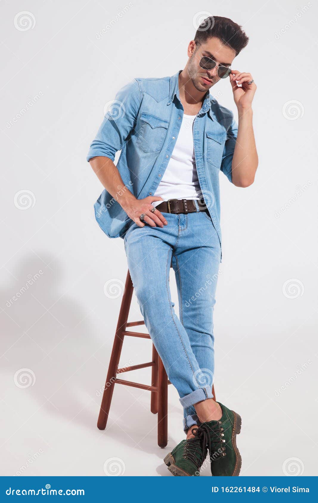 Serious Casual Man Taking Off His Sunglasses Stock Photo - Image of ... Serious Casual Man Taking Off His Sunglasses Stock Photo - Image of ...