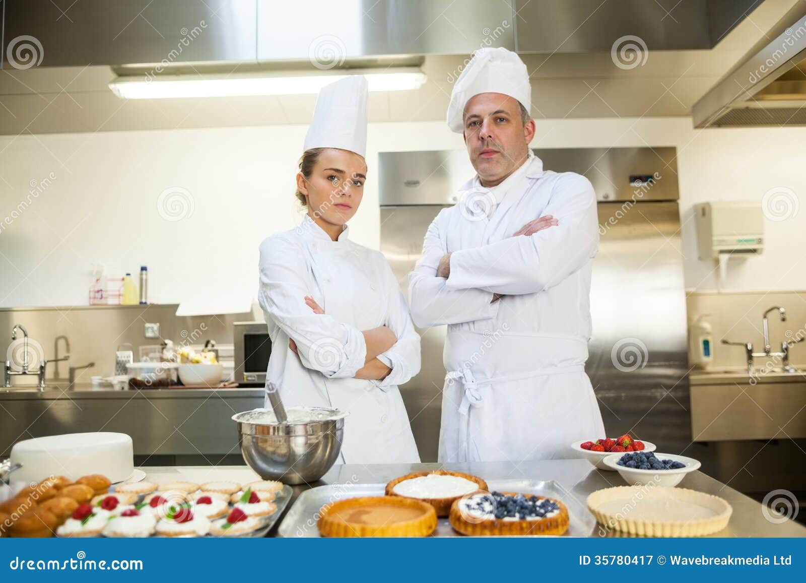 Serious Chef and Head Chef Standing Arms Crossed Stock Image - Image of ...