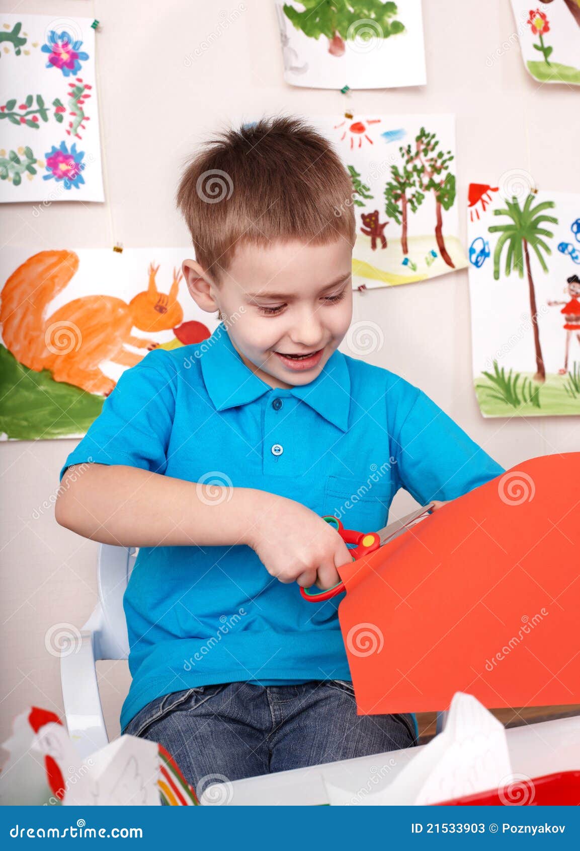 Serious Child Cutting Paper. Stock Image - Image of scissors ...