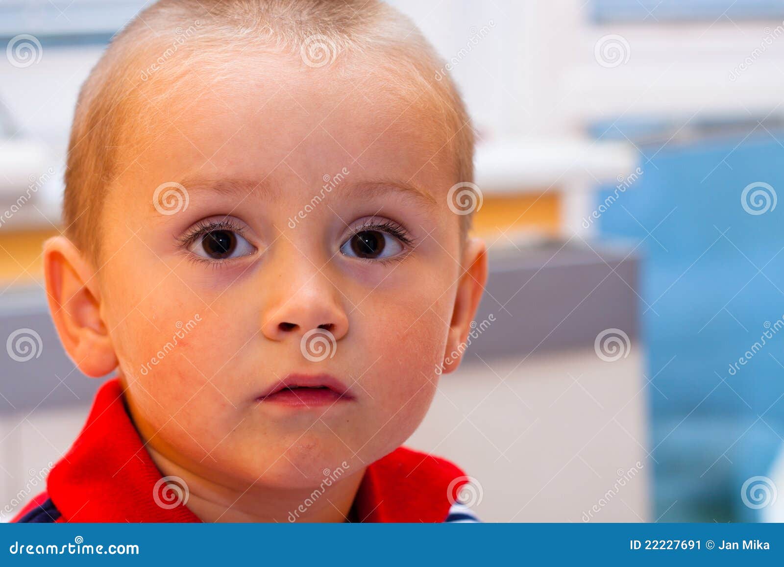 Serious child face stock image. Image of feeling, portrait - 22227691