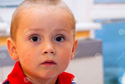 Serious child face stock image. Image of feeling, portrait - 22227691