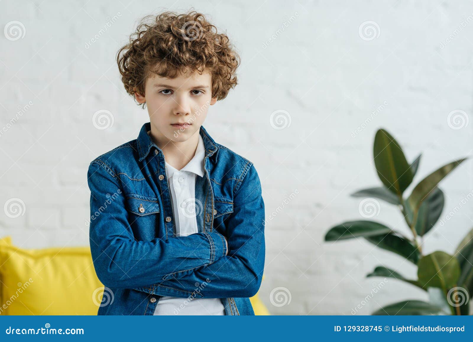 Serious child standing stock image. Image of angry, person - 129328745