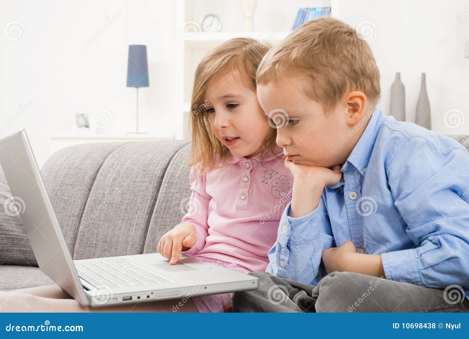 Serious Children with Laptop Stock Photo - Image of color, children ...