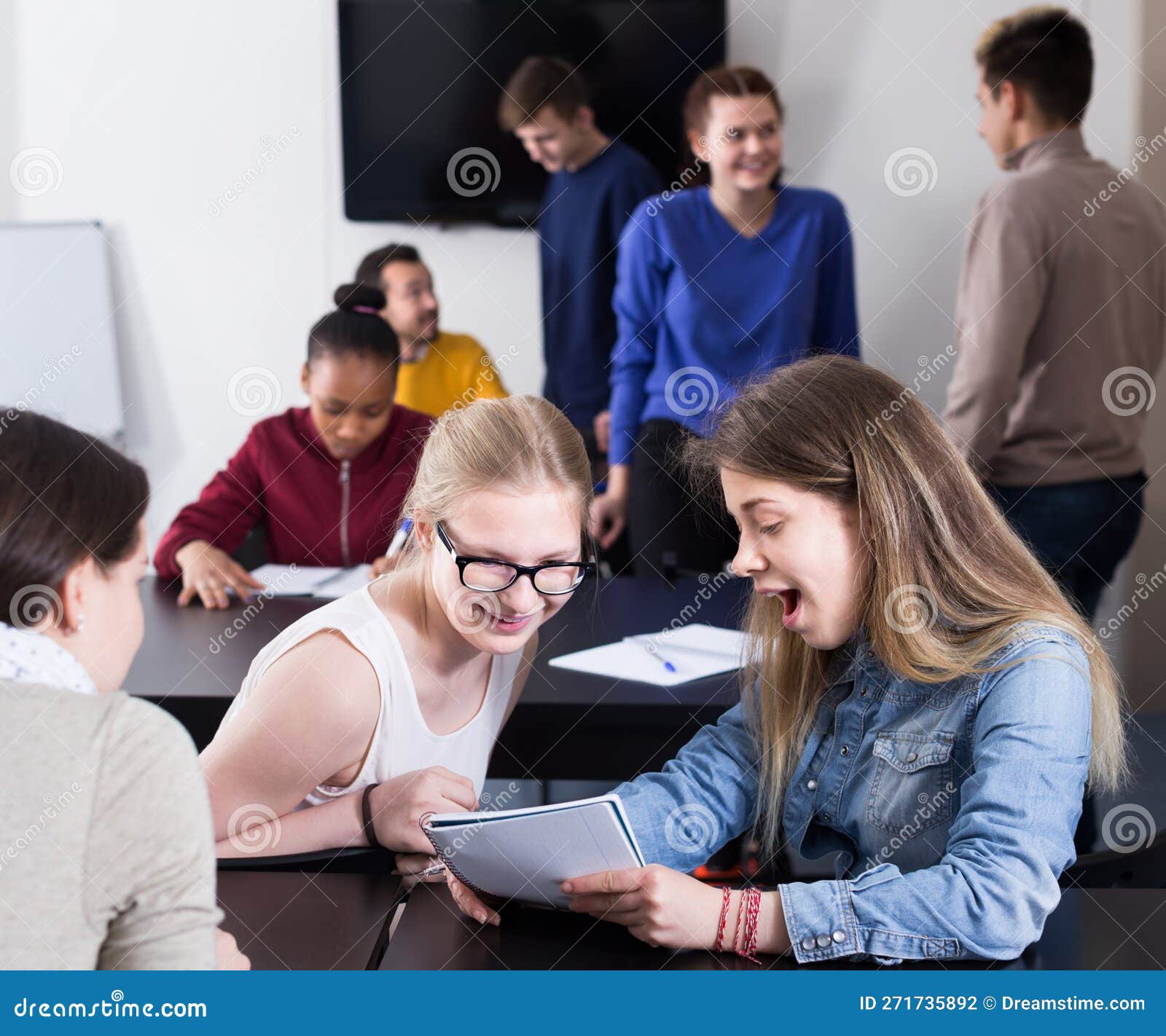 Serious Classmates Having Animated Talks at Break between Classes Stock ...