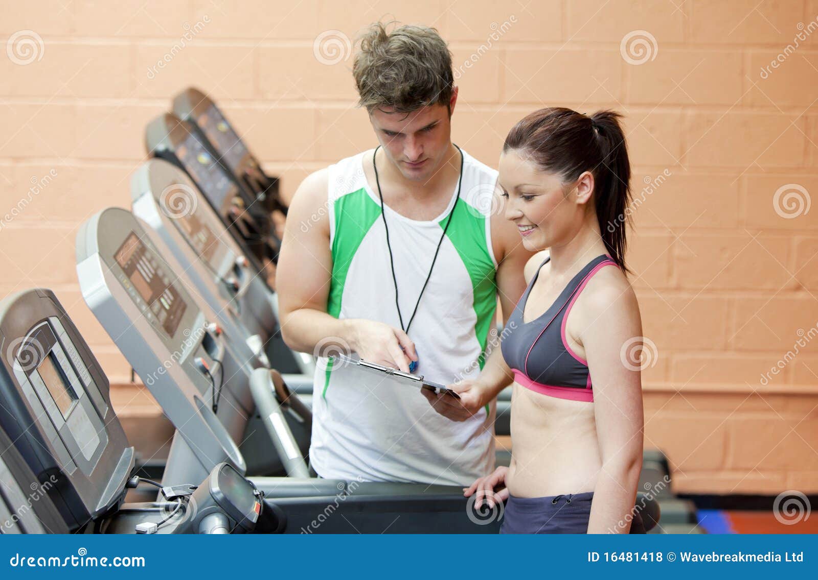 Serious Coach Giving Instruction To a Female Stock Photo - Image of ...
