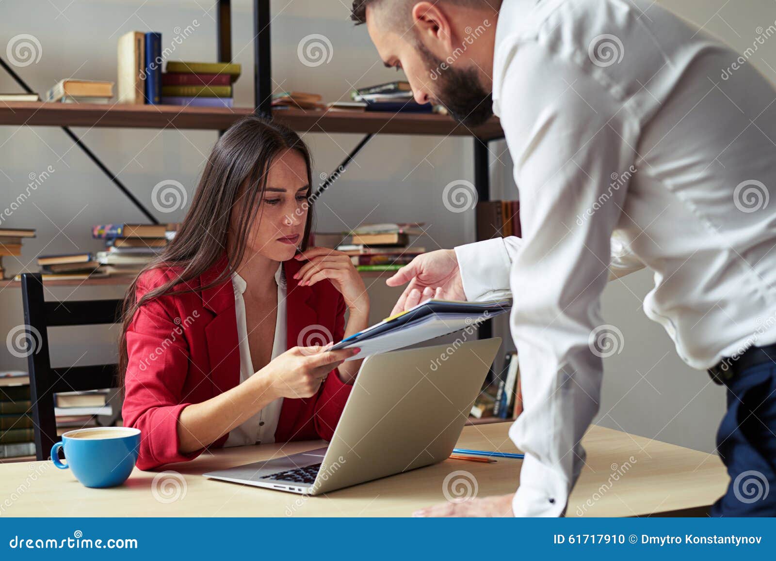 Serious Colleagues Discussion and Looking at Documents Stock Photo ...
