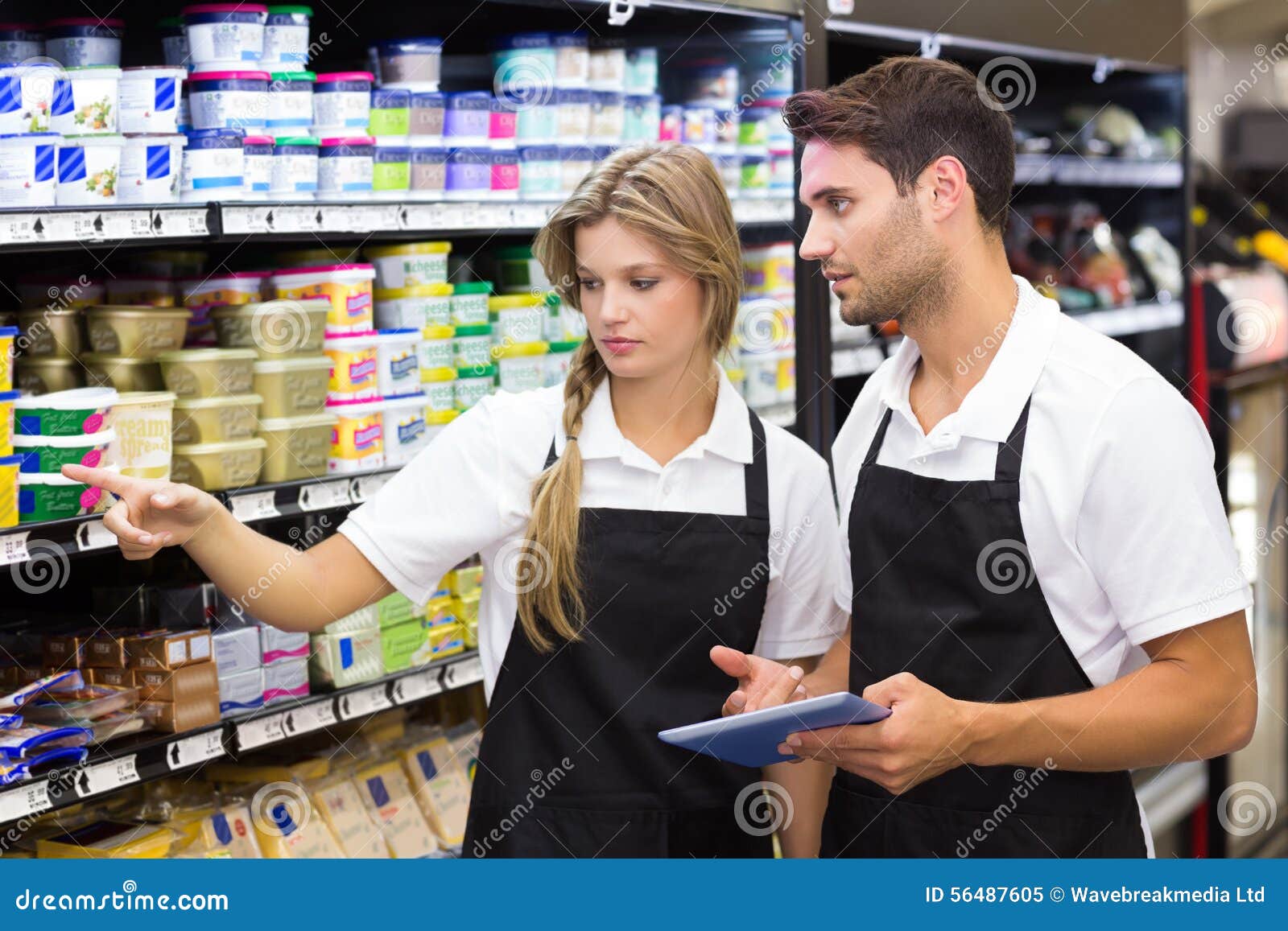 Serious Colleagues Showing and Using a Digital Tablet Stock Image ...