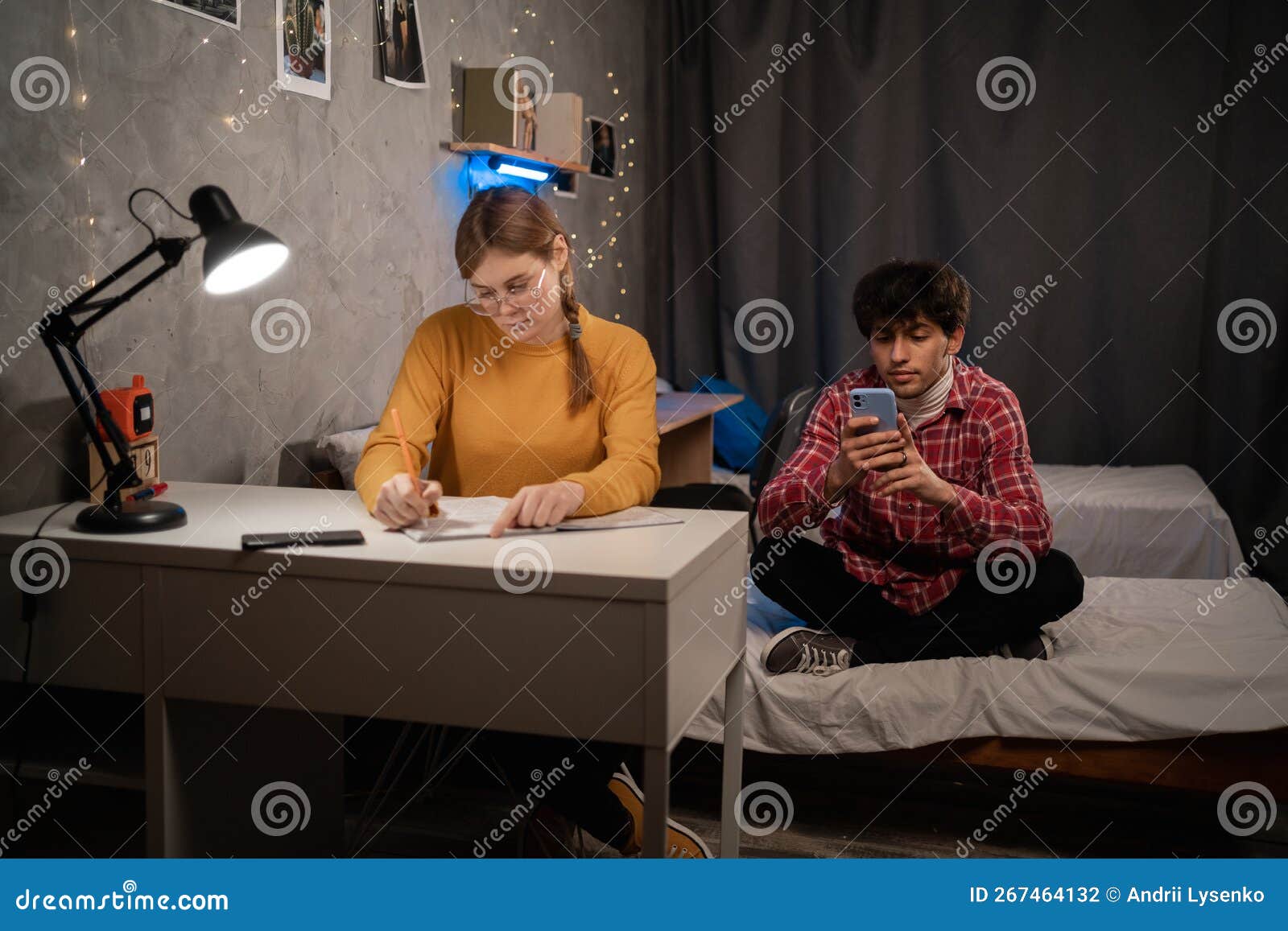 Serious College Students Studying in Dormitory at Night. Stock Photo ...