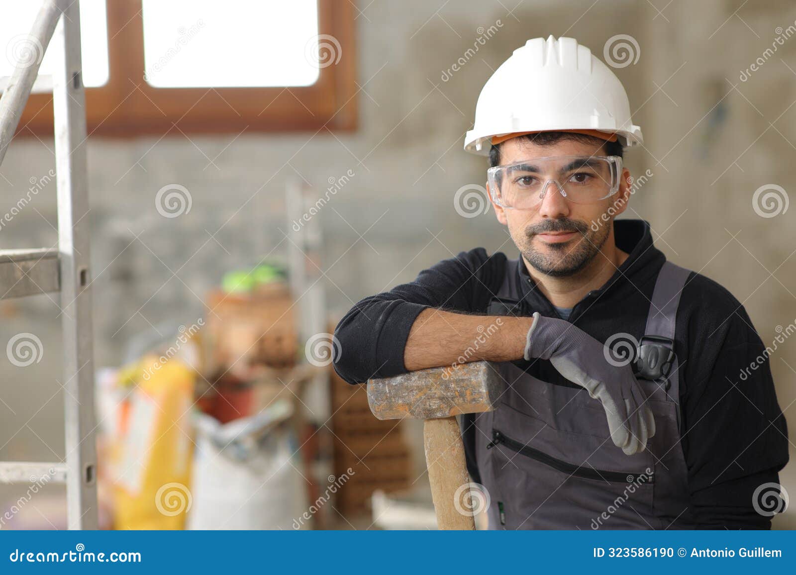 Serious Construction Worker Posing in a House Under Renovation Stock ...