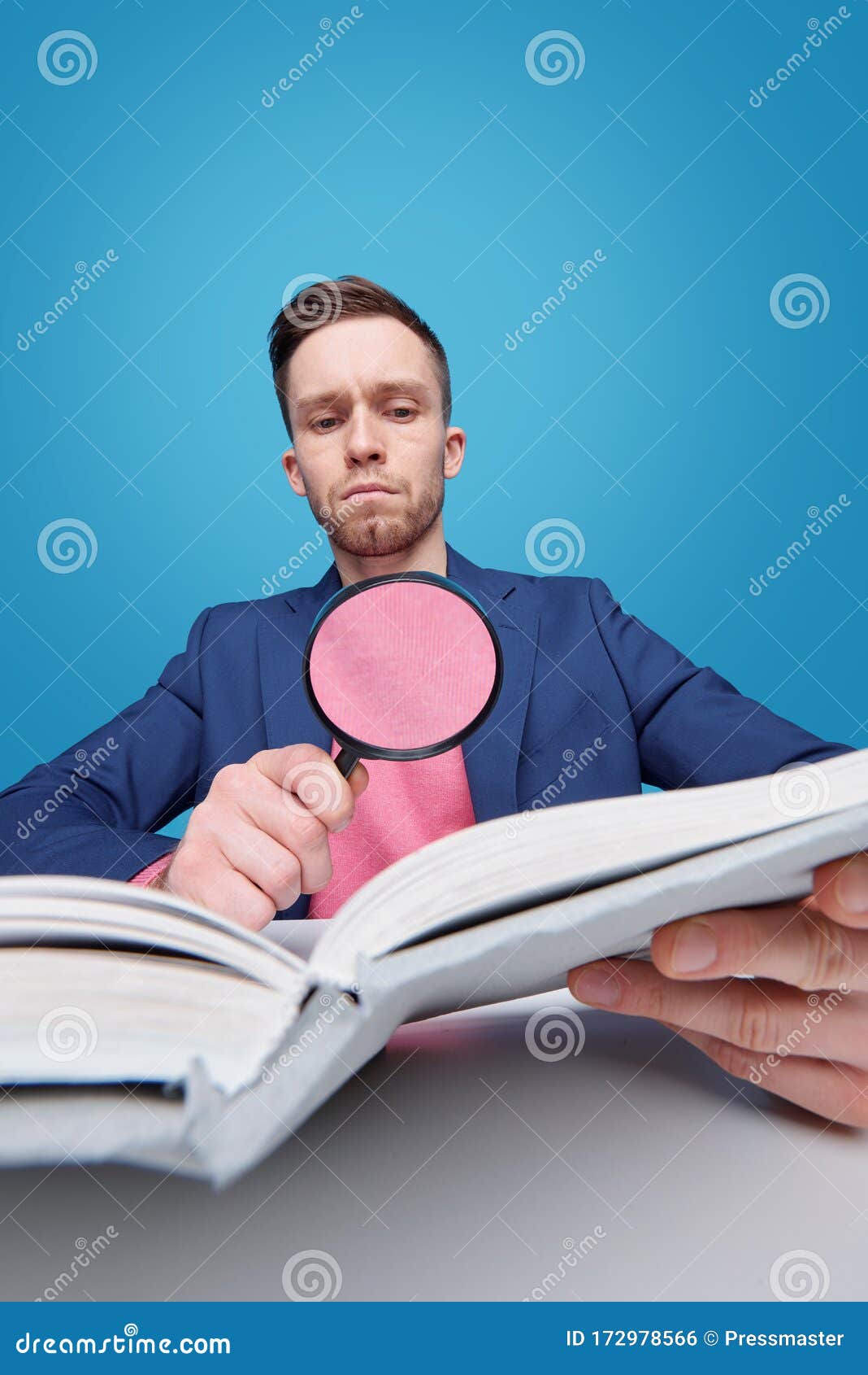 Reading through Magnifying Glass Stock Photo - Image of document ...