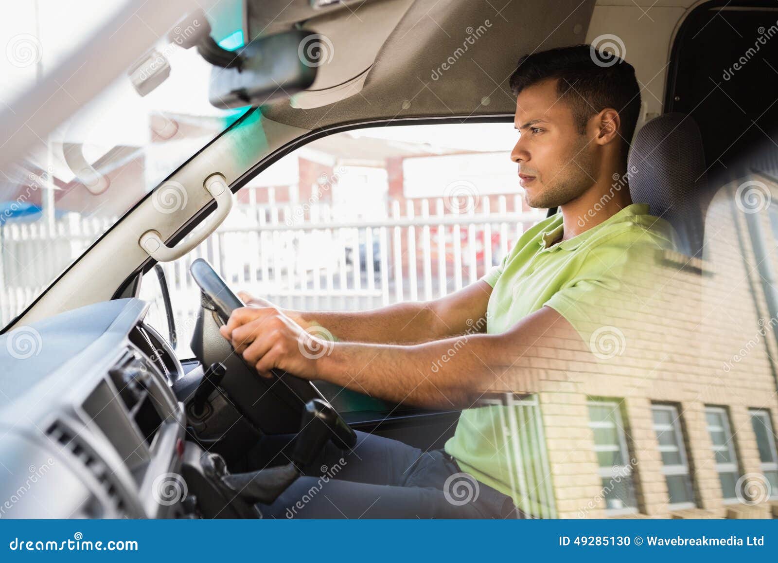 Serious Delivery Man Driving His Van Stock Photo - Image of loading ...