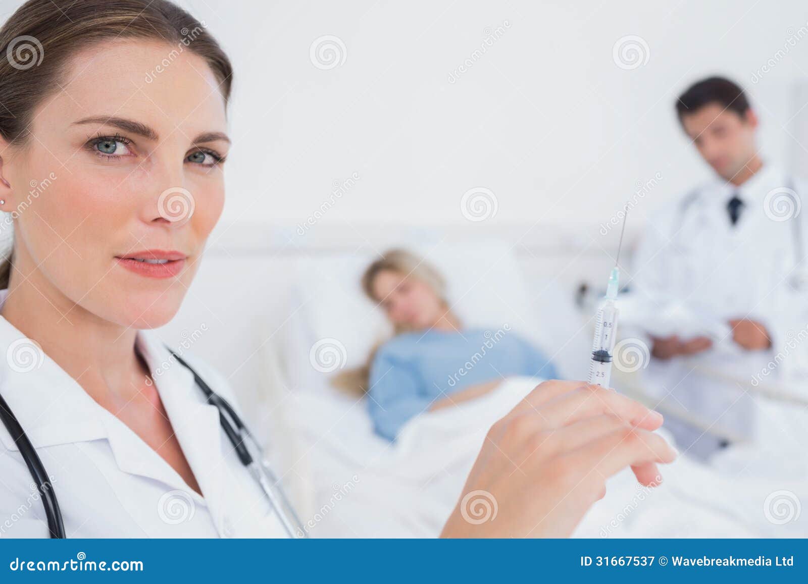 Serious Doctor with a Syringe Stock Image - Image of earnest ...